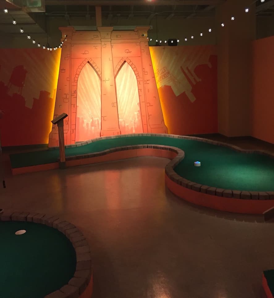 New indoor mini golf course is a cheesy fun ode to Brooklyn